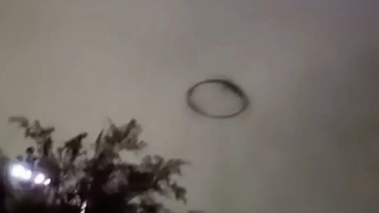 Mysterious Black Ring Hovers Over Disneyland - YouTube