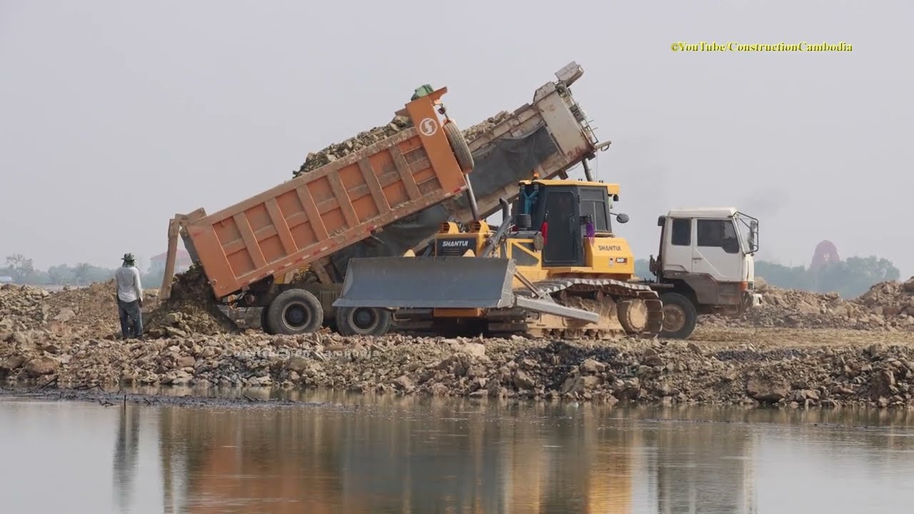 Powerful Dump Trucks Unloading Rocks And Bulldozer Pushing Rocks - YouTube