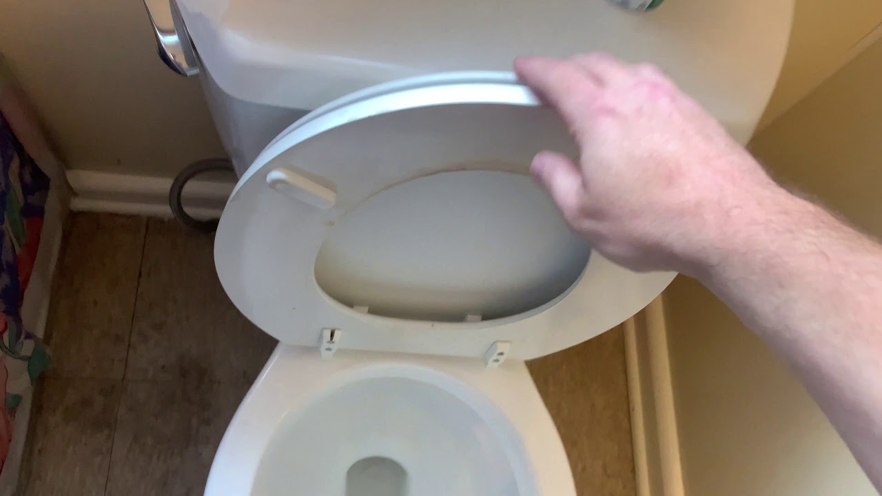 Bathroom tour: Kohler toilet at an auto mechanic - YouTube
