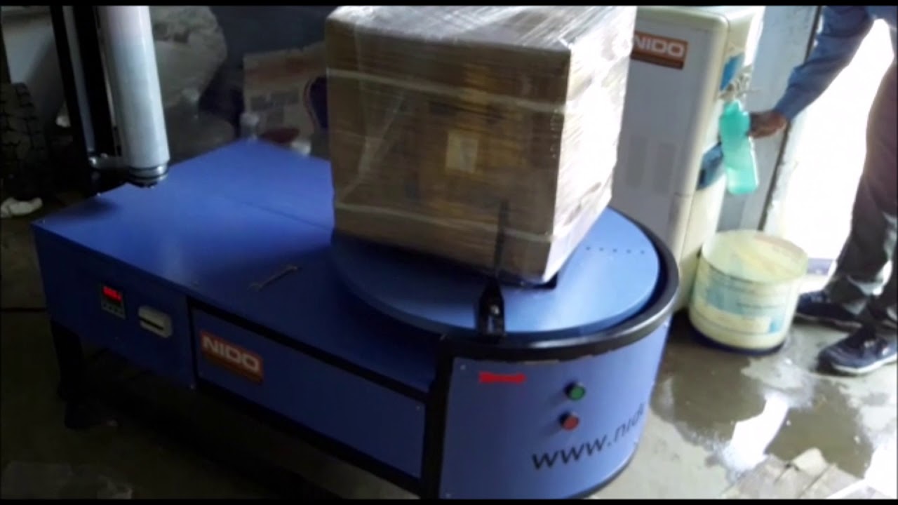 NIDO Box Stretch Wrapping Equipment Mechanical Stretch - YouTube