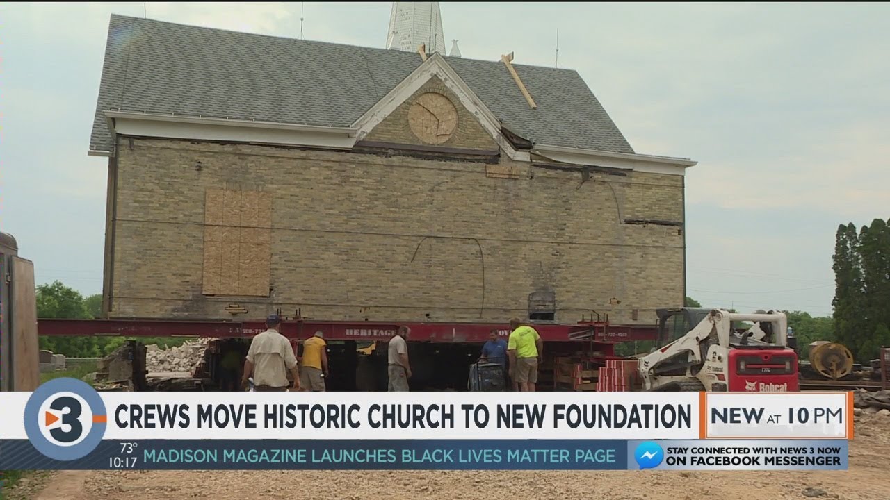 Crews move historic church to new foundation - YouTube