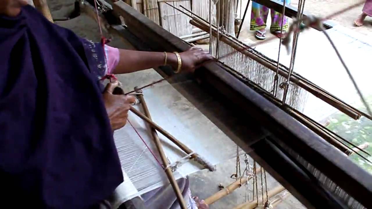 Assamese weaver in feet loom ( weaving endi) Assam Silk - YouTube