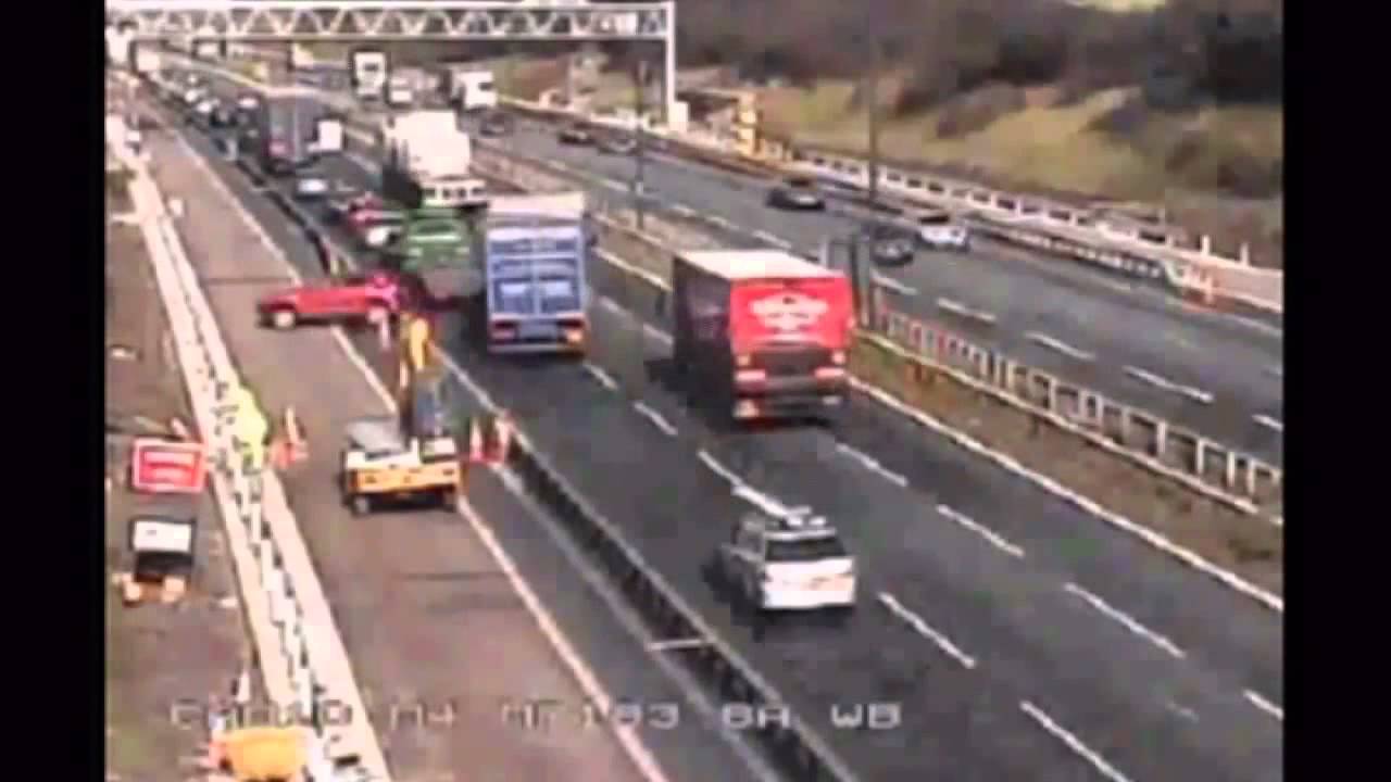 Shocking CCTV footage shows vehicles crashing into the roadworks - YouTube