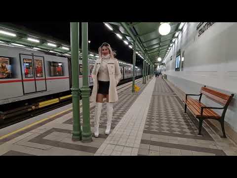 Granate Styling, walking in #Metro Station waiting on train, white #otk boots, high heels, shorts