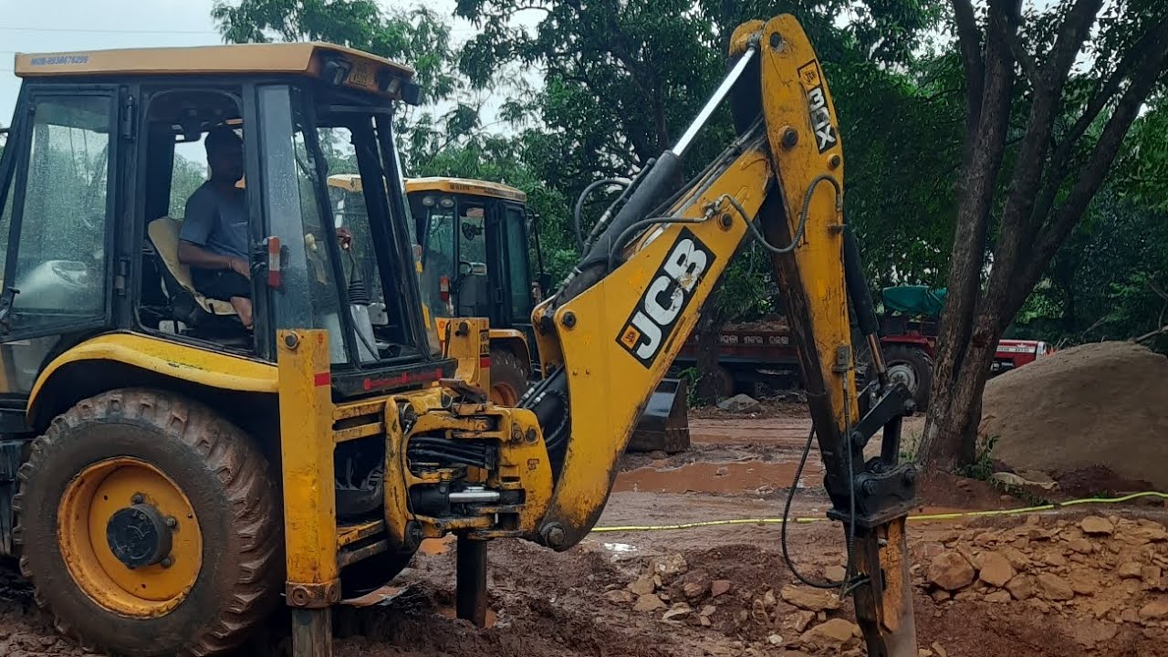 JCB at Construction Site | Drilling & Stone breaking Work - YouTube