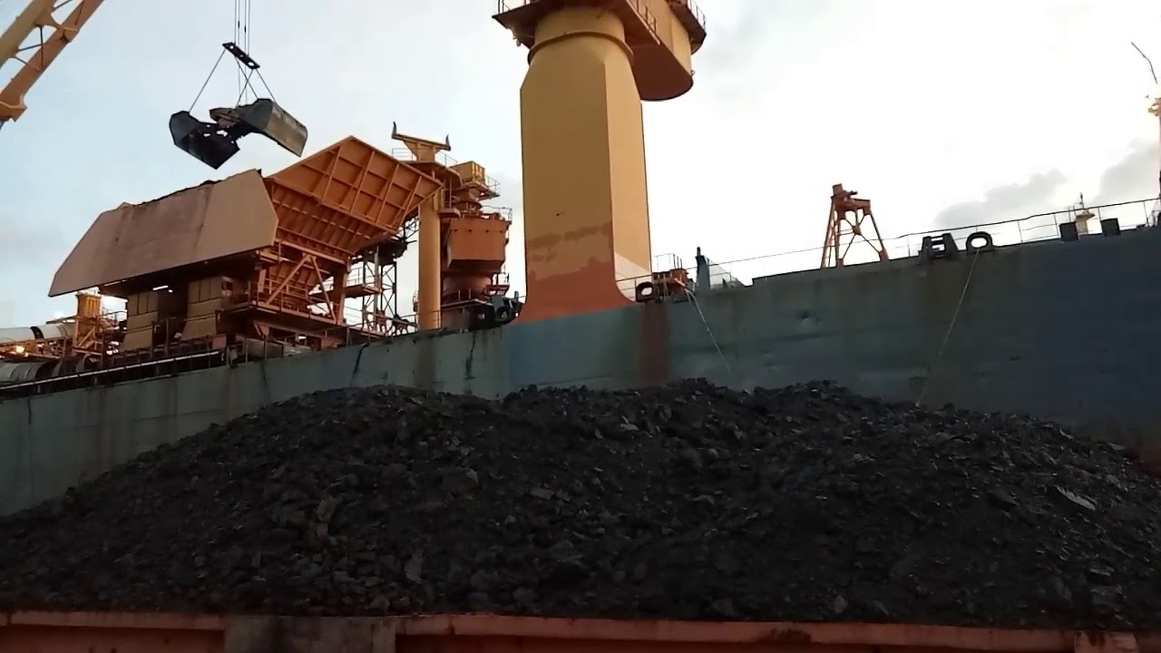 Process Loading Cargo From Barge to Mother Vessel by Floating Crane ...
