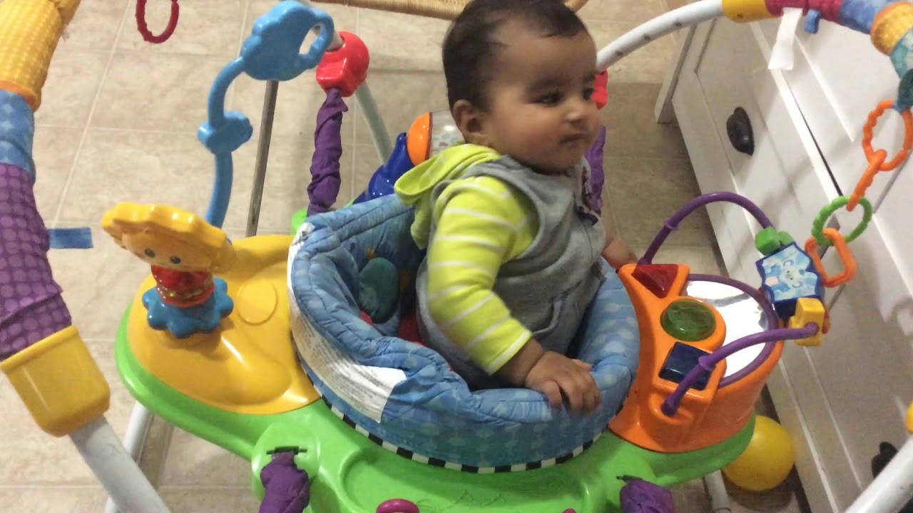 Baby enjoying in baby Einstein Activity Jumper - YouTube
