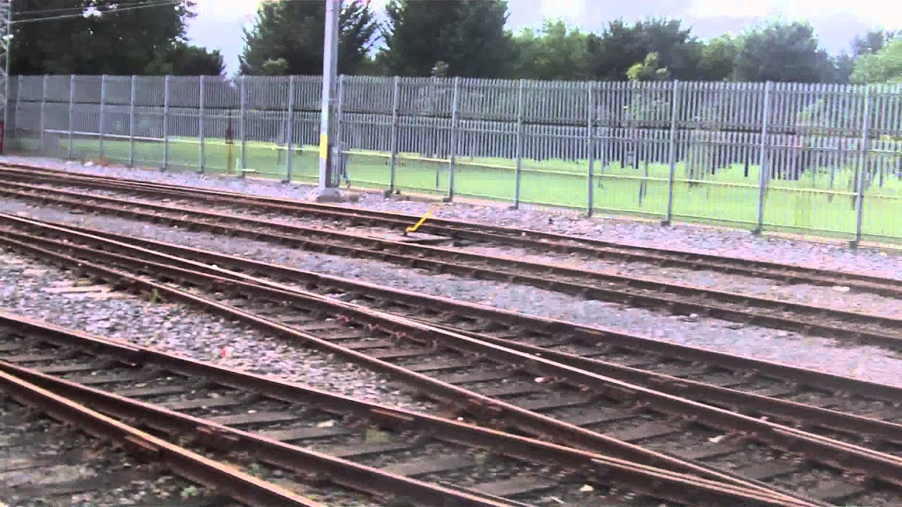Passing the Clontarf Road dart depot with vandalised 8200 class darts ...