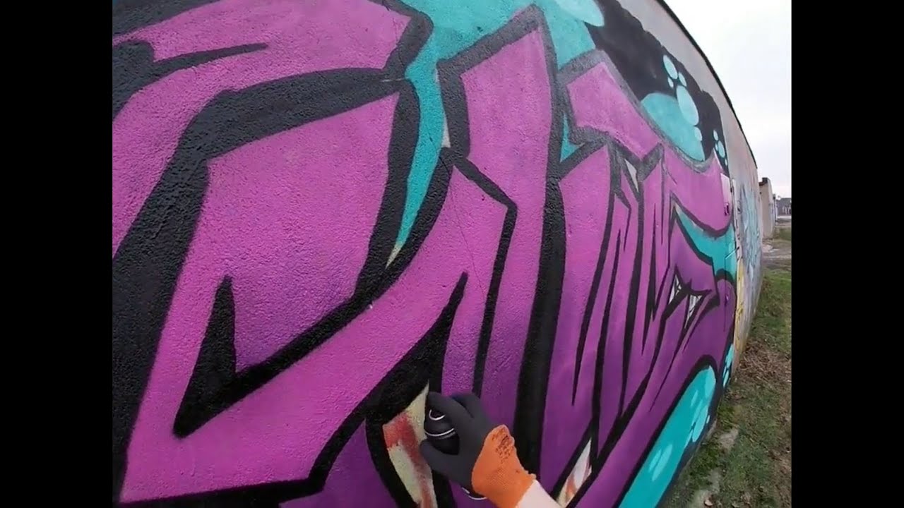 Violet piece on garage wall (by Graffiti Production) - YouTube