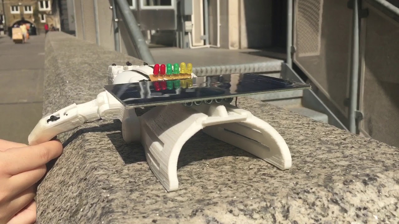 Haptic feedback system for a prosthetic hand - YouTube