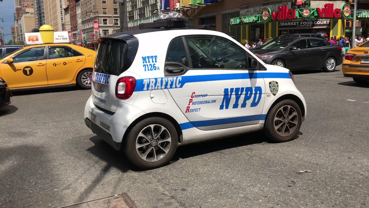 BABY MINI NYPD TRAFFIC SMART CAR PATROLLING ON WEST 42ND STREET IN HELL ...