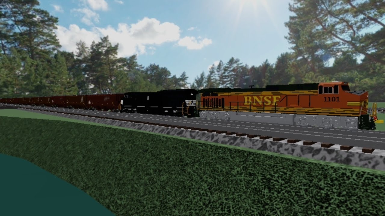 BNSF 1101 Ex H1 and T4 NS leading a Erath worm train headed to Chicago with DPU - YouTube