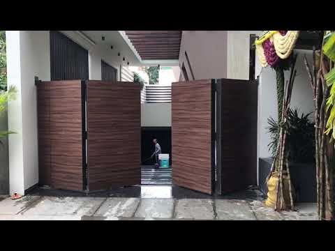Garage folding gate with fundermax and automation - YouTube