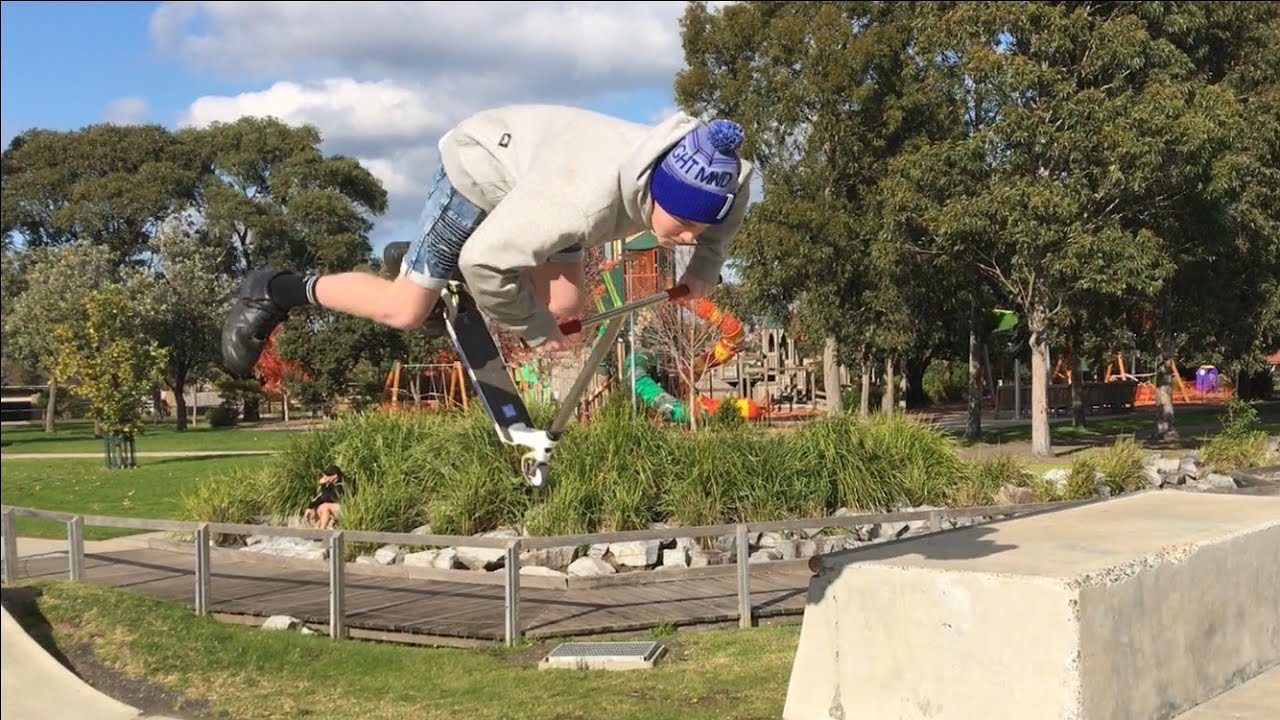 SCOOTER KID FALLS DOING A BACKFLIP - YouTube