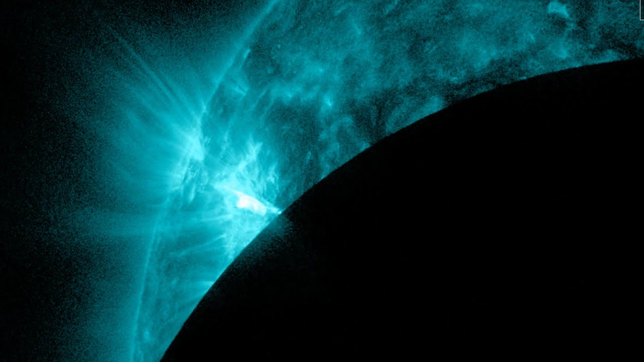 Volatile sunspot gets photobombed by the moon in amazing spacecraft ...