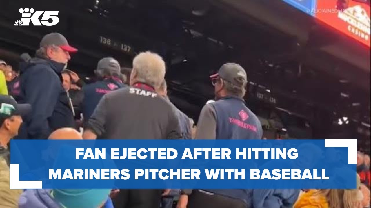 Fan ejected after hitting Mariners pitcher with ball - YouTube