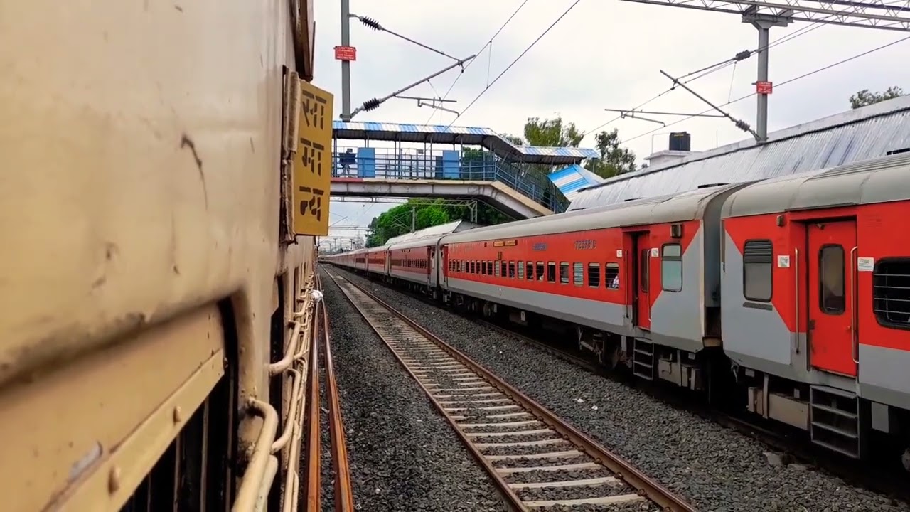 Avantika express arriving at Dewas junction while Indb Ngd Passenger ...