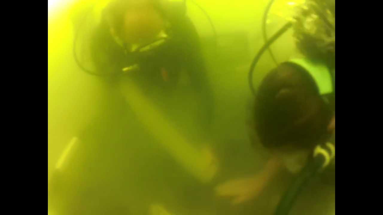 Dr. John Bratten and Benjamin Wells Excavating Emanuel Point II ...