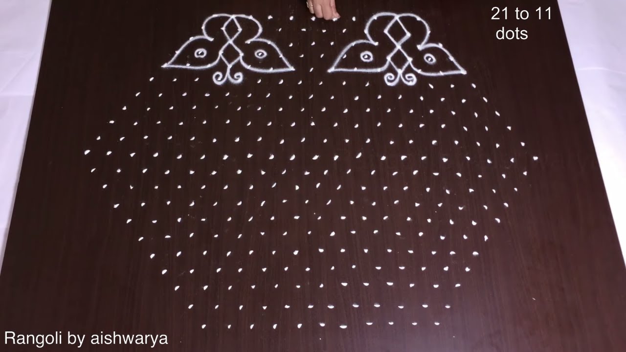 Top Rangoli Designs for Competition With 21 to 11 | Butterfly Kolam ...