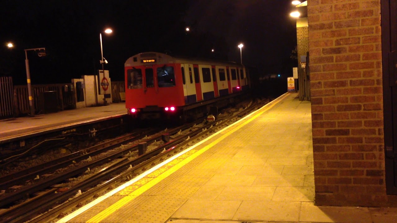 District Line D78 Stock Train Unit 7017 entering Ealing Common Depot ...