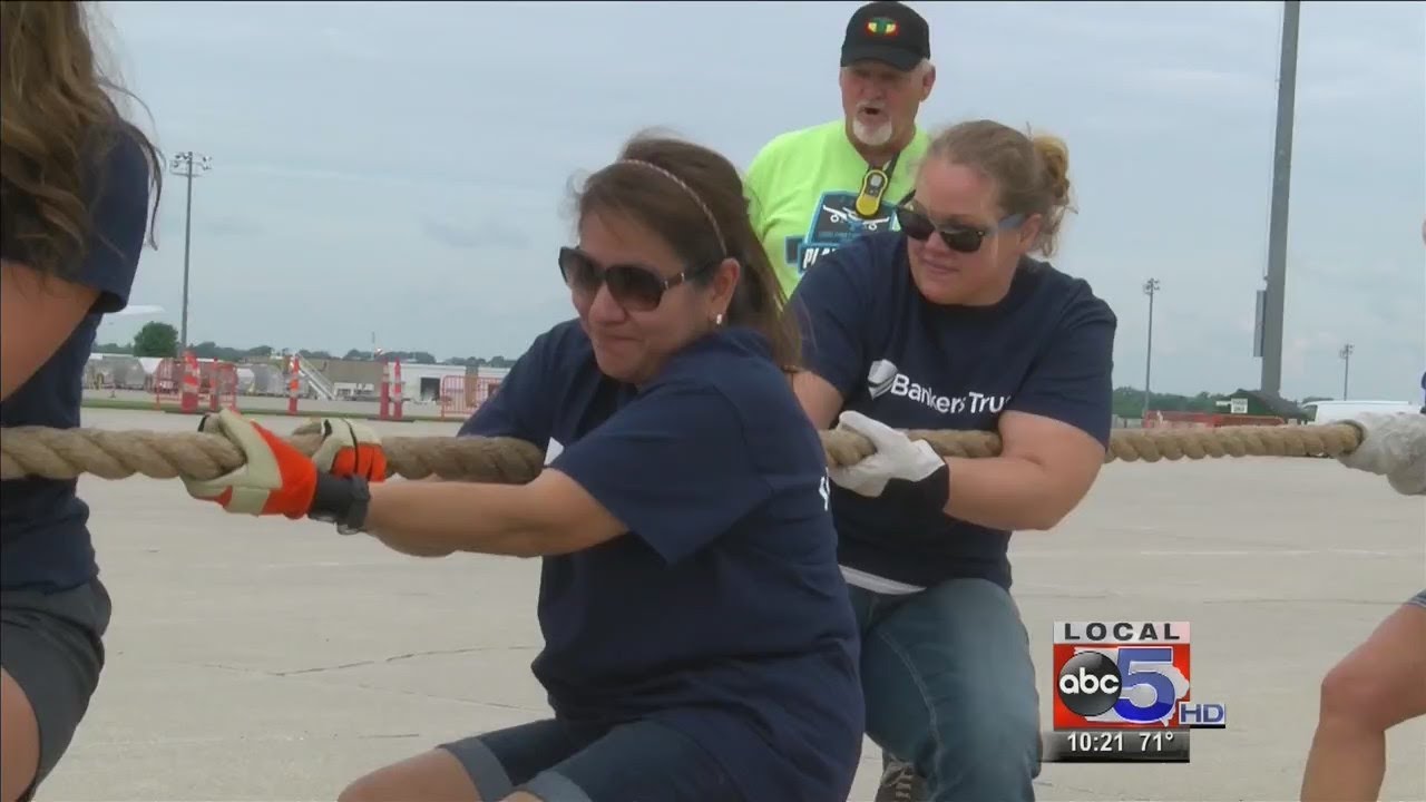 Special Olympics hosts annual plane pull - YouTube