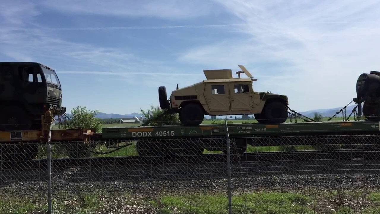 Military vehicle train transport - YouTube