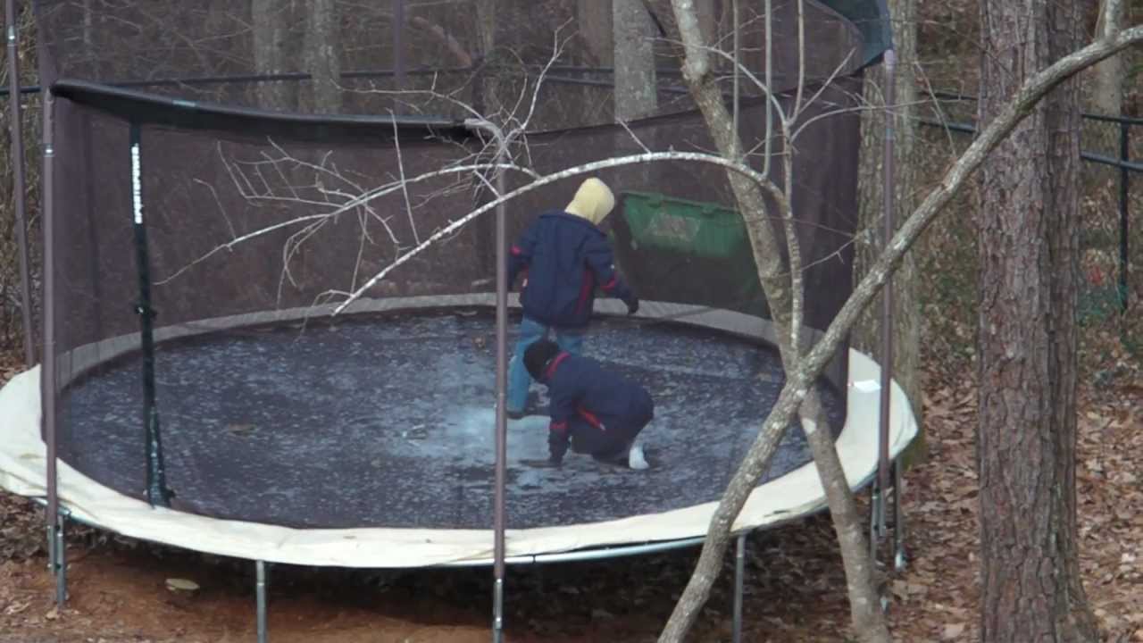 Jumping on Iced Trampoline (falling & slipping ensues) - YouTube