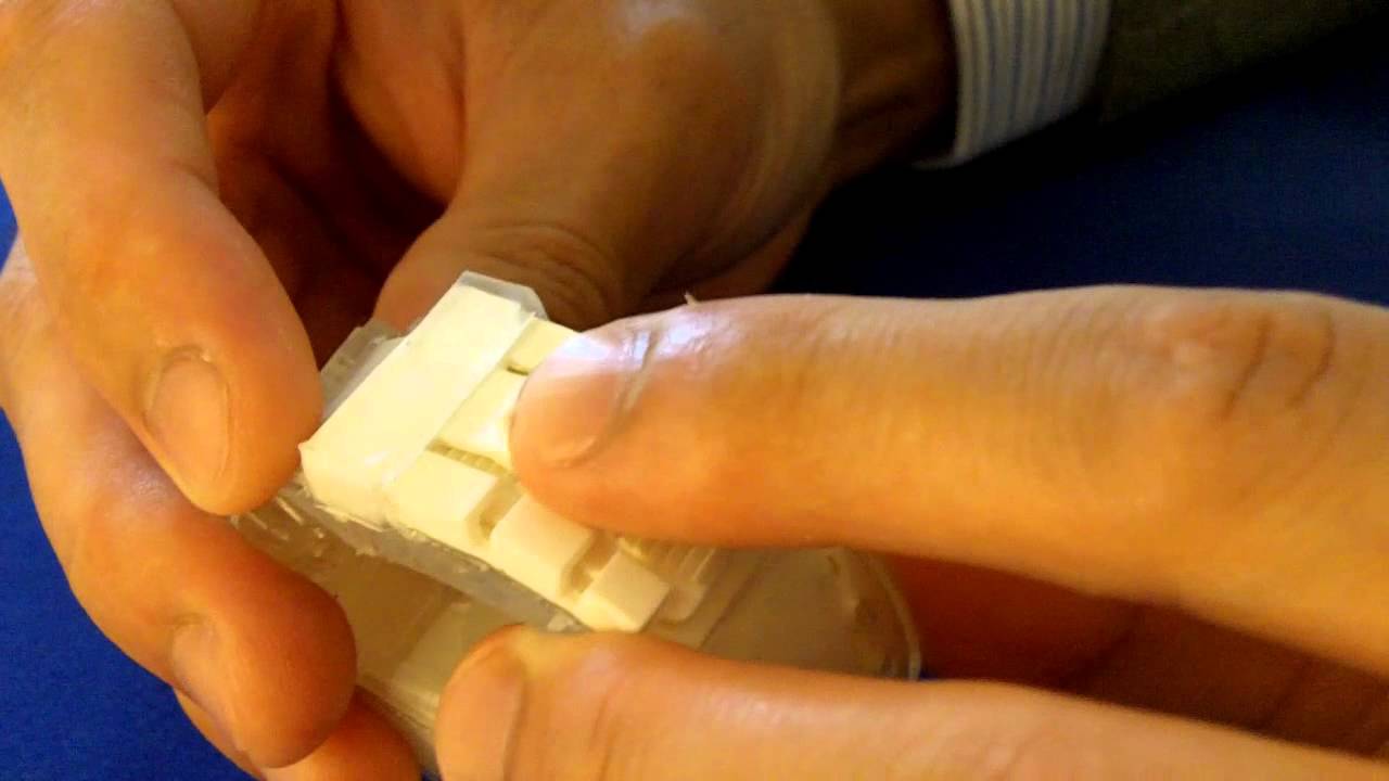 Gently Lift the Tie Tab Mechanism - YouTube