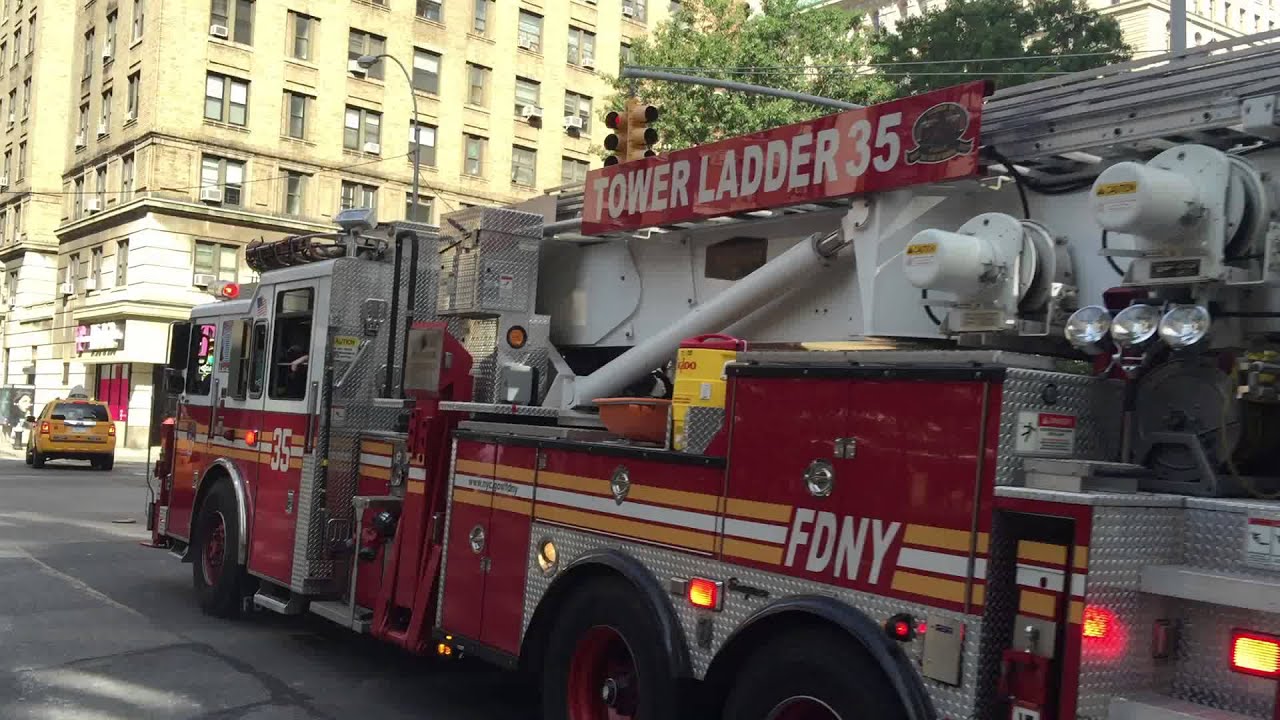 FDNY TOWER LADDER 35 RESPONDING ON WEST 77TH STREET ON THE WEST SIDE OF ...