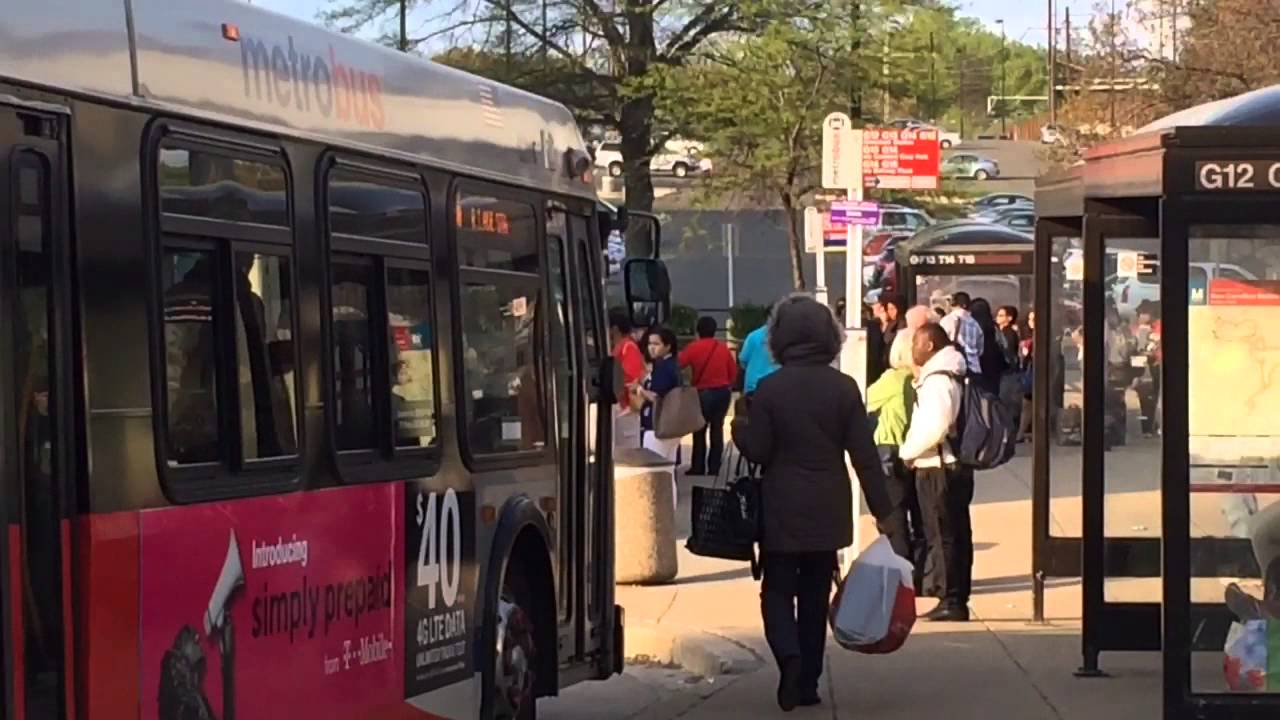 WMATA 2006 New Flyer D40LFR 6211 on Route T18 and 2000 Orion V 2218 on ...