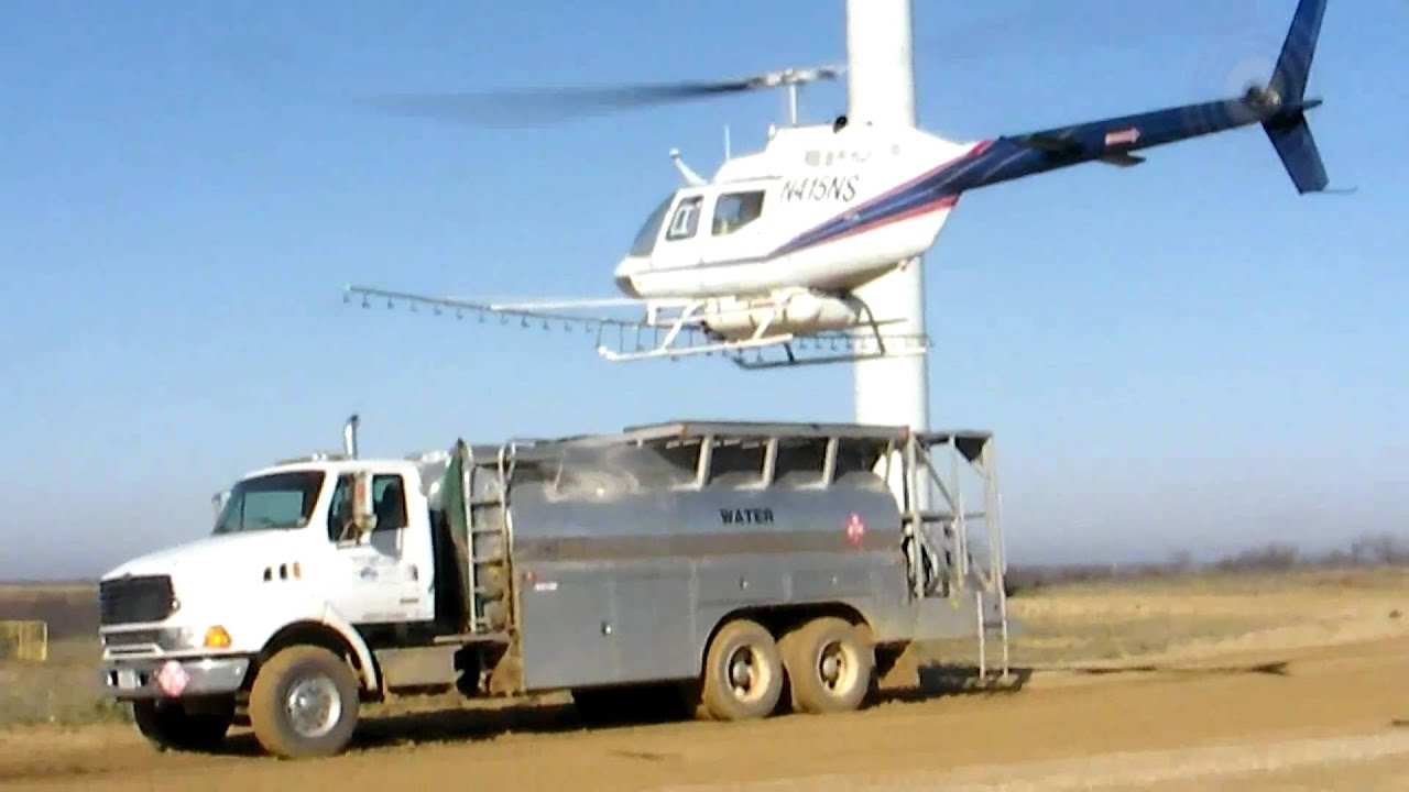 Agricultural spraying in helicopter, OH-58 - YouTube