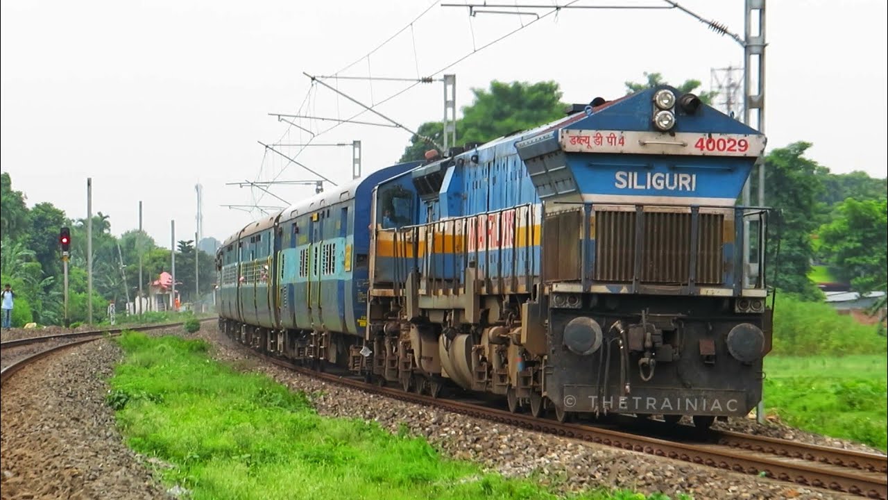 NJP bound Capital Exp with blue ICF Rake hauled by Siliguri WDP4B ...