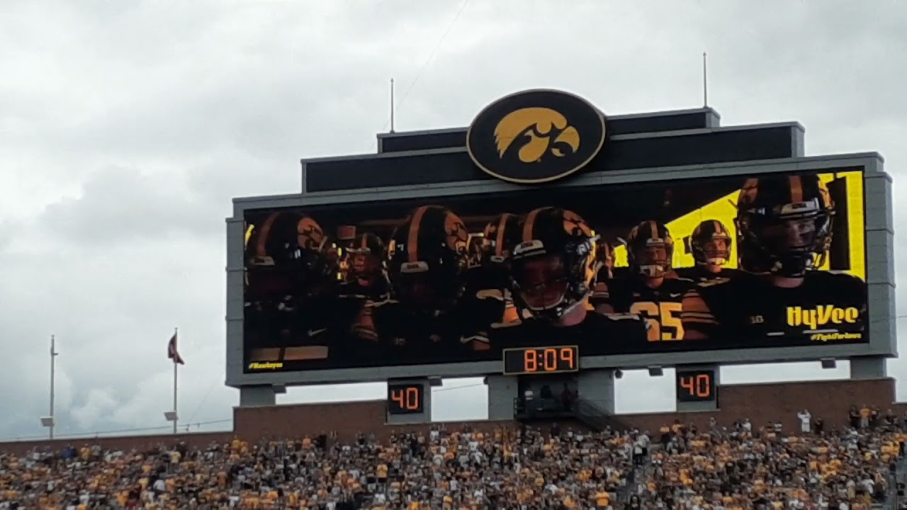 2021 Iowa Hawkeye football players Swarm the field - YouTube
