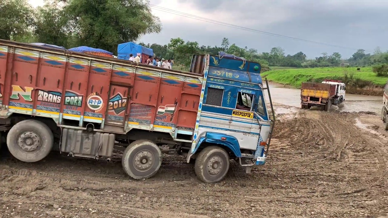 Bharatbenz 4928, Tata 3718 lpt, and Tata 4018 lps crossing river ...