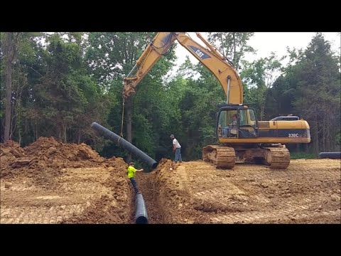 CLAY VS. CRUSHED GRAVEL; Installing a culvert pipe; Water erosion ...