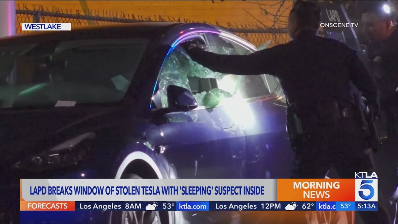 Police break window of stolen Tesla with ‘sleeping’ suspect inside ...