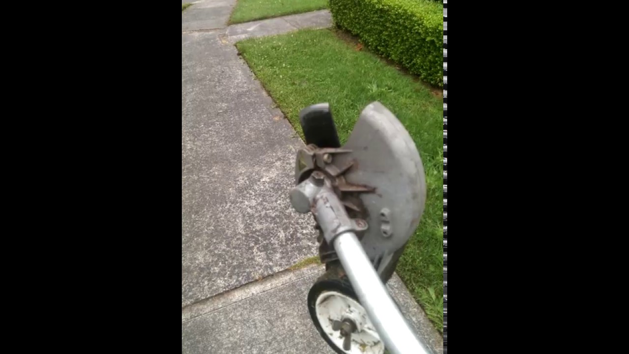 stick edger for edging a straight line in the lawn - YouTube