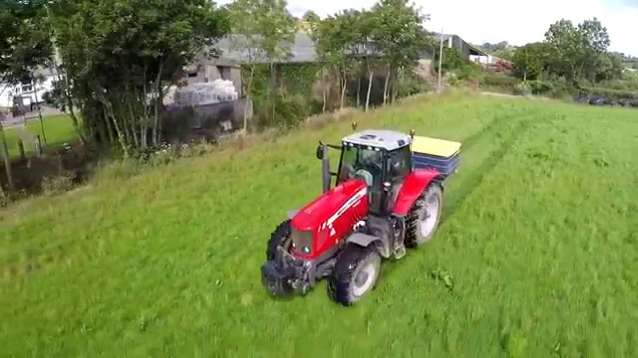 Spreading Fertilizer with Massey Ferguson 7499 - YouTube