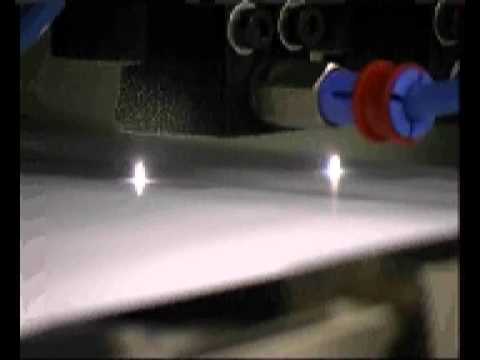 High speed paper/plastic perforation using carbon dioxide lasers - YouTube