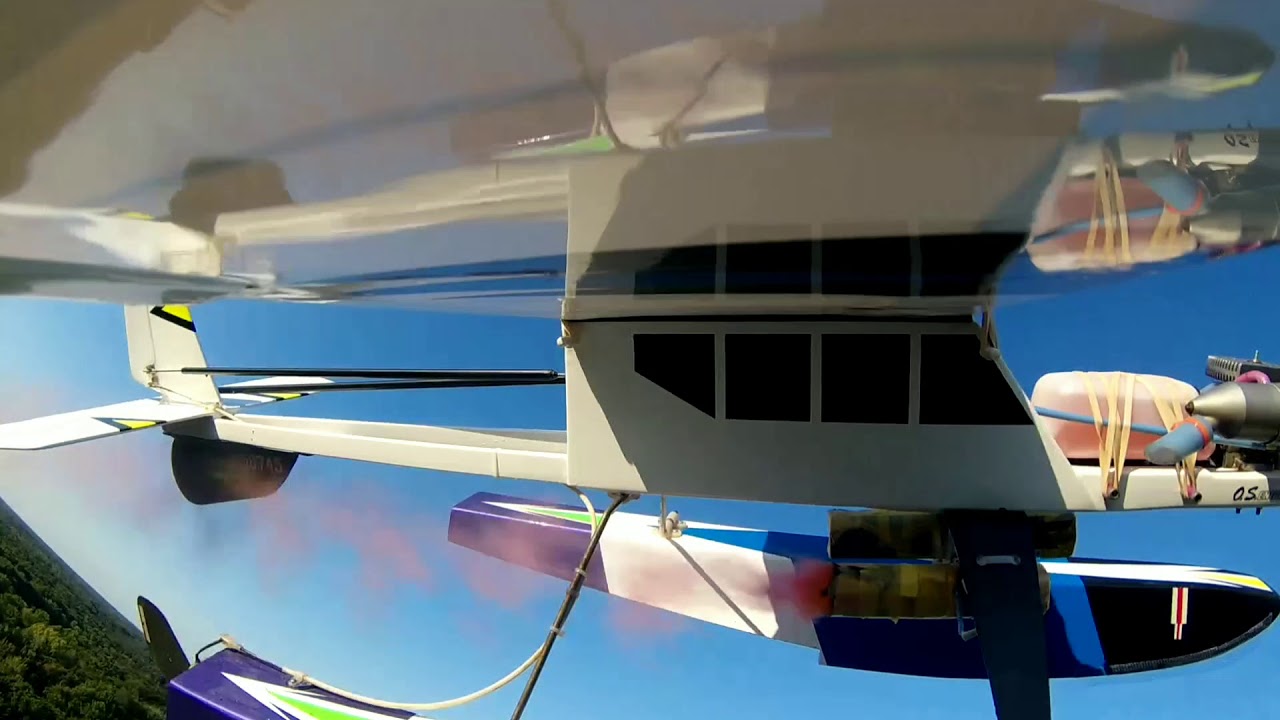 Balsa USA Stick 40 on great planes sport floats with smoke - YouTube