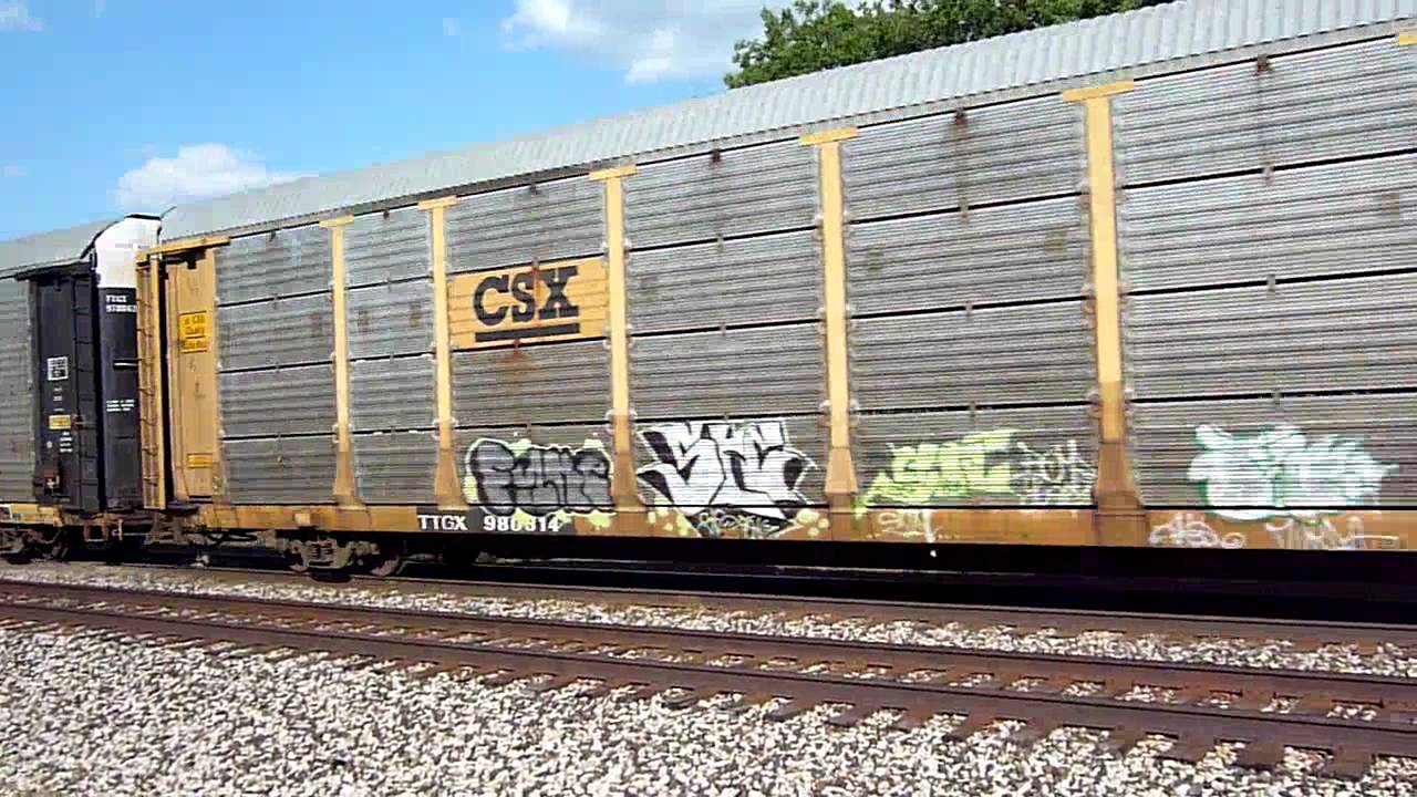 CN 2580, 5537 head Eastbound freight train with Burlington Northern ...