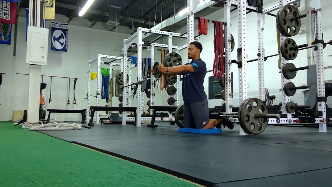 Nordic Hamstring Plate Reach Out Iso Hold - YouTube