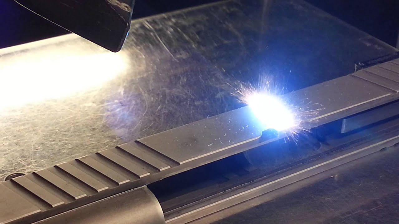 Laser engraving 1911 slide on the QM50+ laser - YouTube