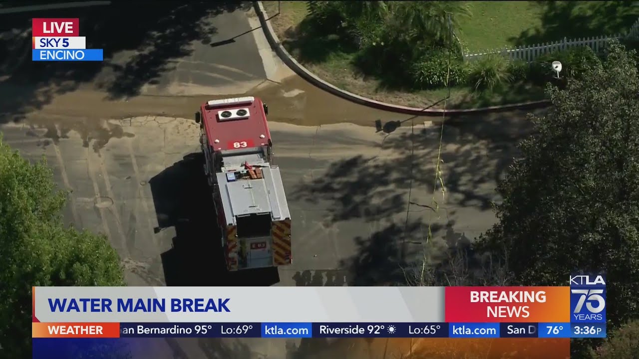 Residential street in Encino drenched following water main break - YouTube