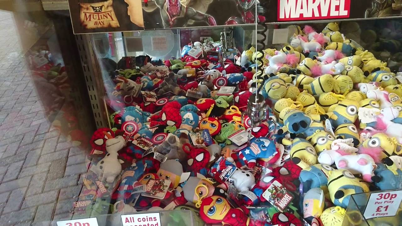 Playing The Marvel Superheroes Grab Claw Machine In The Arcades - YouTube