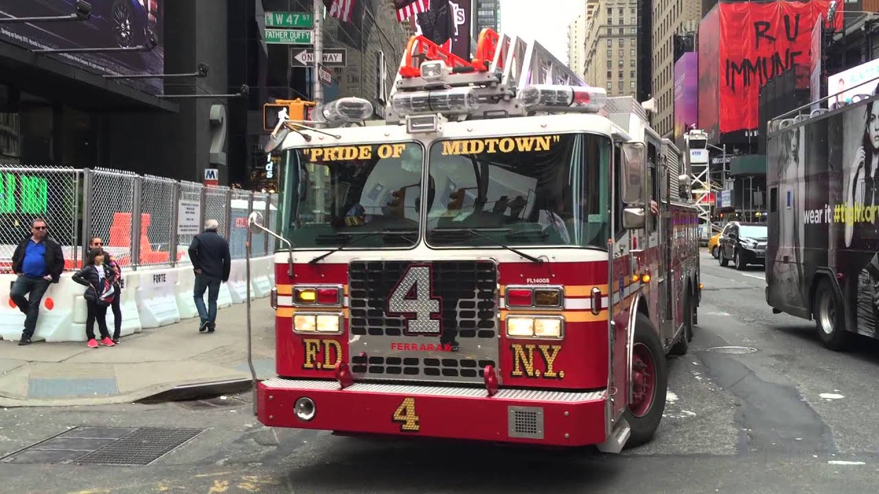 FDNY LADDER 4 CRUISING BY ON 7TH AVENUE, GIVE A WAVE, IN MIDTOWN ...