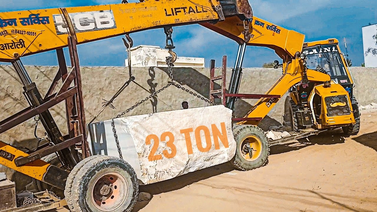 Heavy 23 Ton Marble Block Unloading JCB Liftall - YouTube