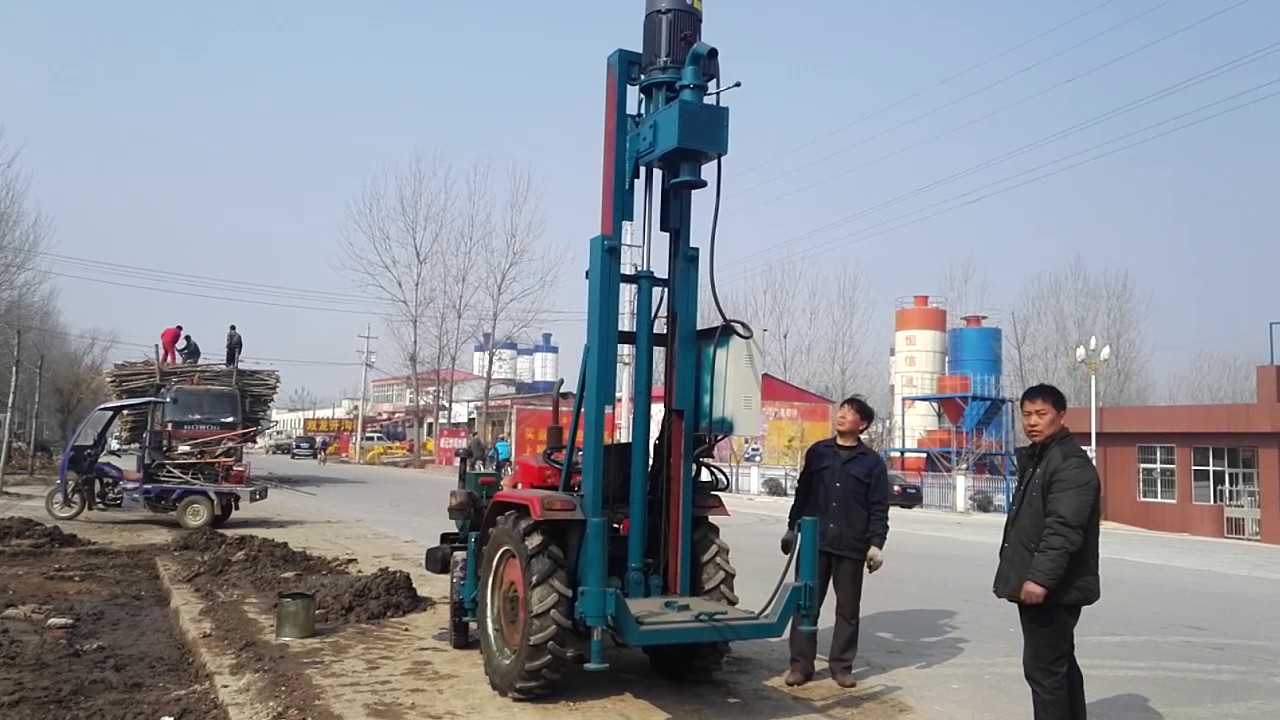 Tractor water well drilling rig - YouTube