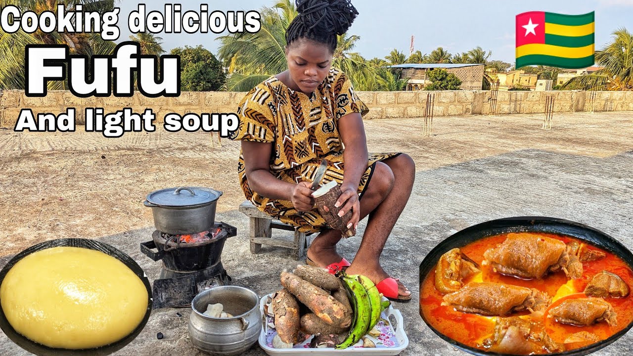 Cooking popular West African Mouthwatering fufu and goat meat light ...