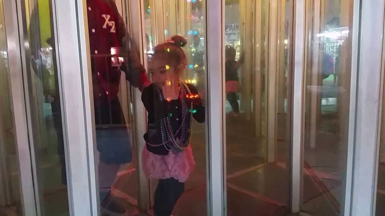 Try not to laugh... Sofia walks the Fun House Mirror Maze at the Fair ...